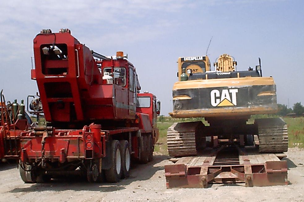 R J Corman Crane Truck and CAT Excavator Rear